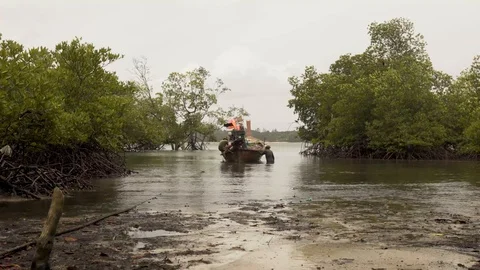 A wide shot of villager going for fishin... | Stock Video | Pond5