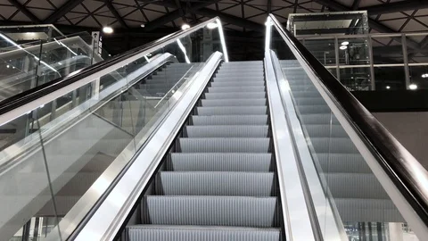 Wide view of moving stairs escalator asc... | Stock Video | Pond5