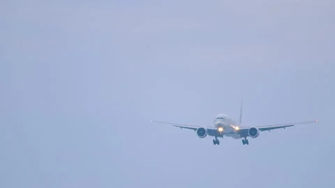 Widebody aircraft flying, front view | Stock Video | Pond5