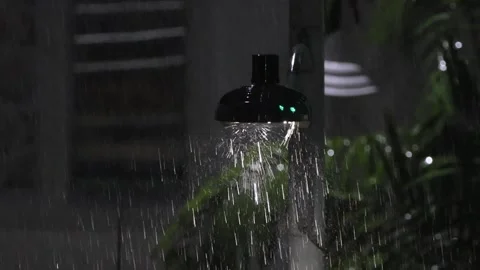 Wind and heavy rain over lamp post at ni... | Stock Video | Pond5