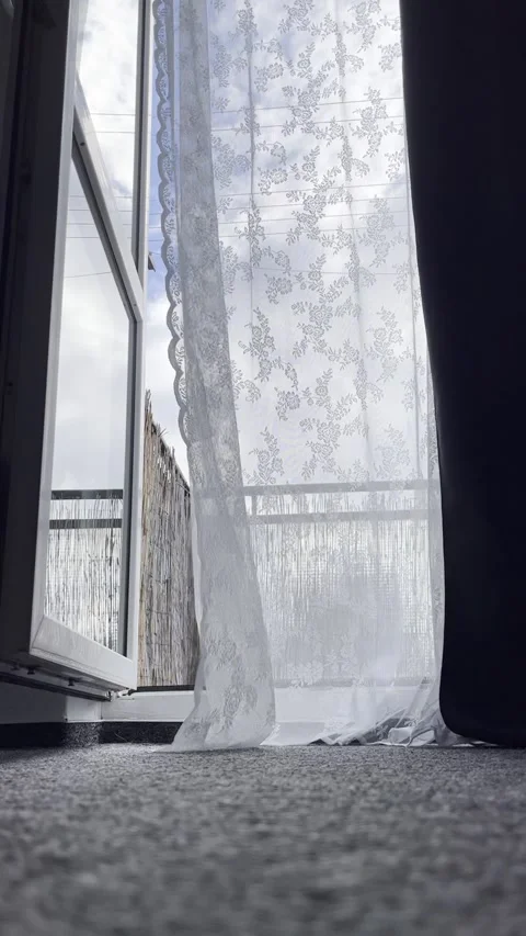 Wind Blowing Lace Curtain in Open Balcon... | Stock Video | Pond5