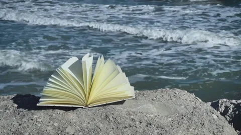 Wind Flipping Notebook Pages Sea | Stock Video | Pond5