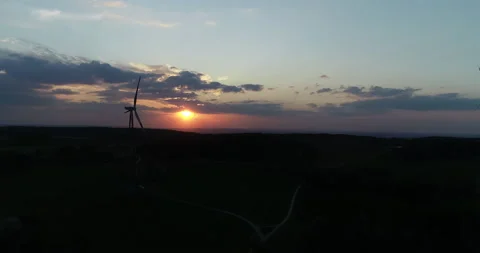 Wind Turbine Drone Shot, sunset with len... | Stock Video | Pond5