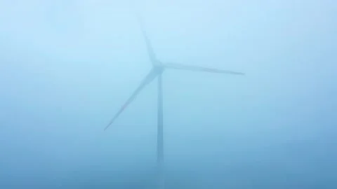 Wind turbine in heavy fog. Wind farm ene... | Stock Video | Pond5