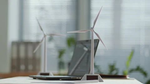 Wind Turbine Models and Laptop on Desk i... | Stock Video | Pond5