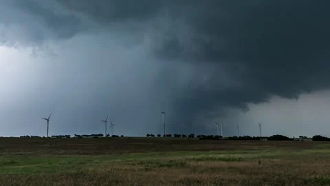 Wind Turbines in front of a Supercell Th... | Stock Video | Pond5