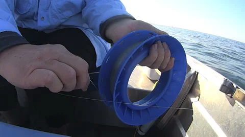 Hand Fishing Reel Stock Footage ~ Royalty Free Stock Videos | Pond5