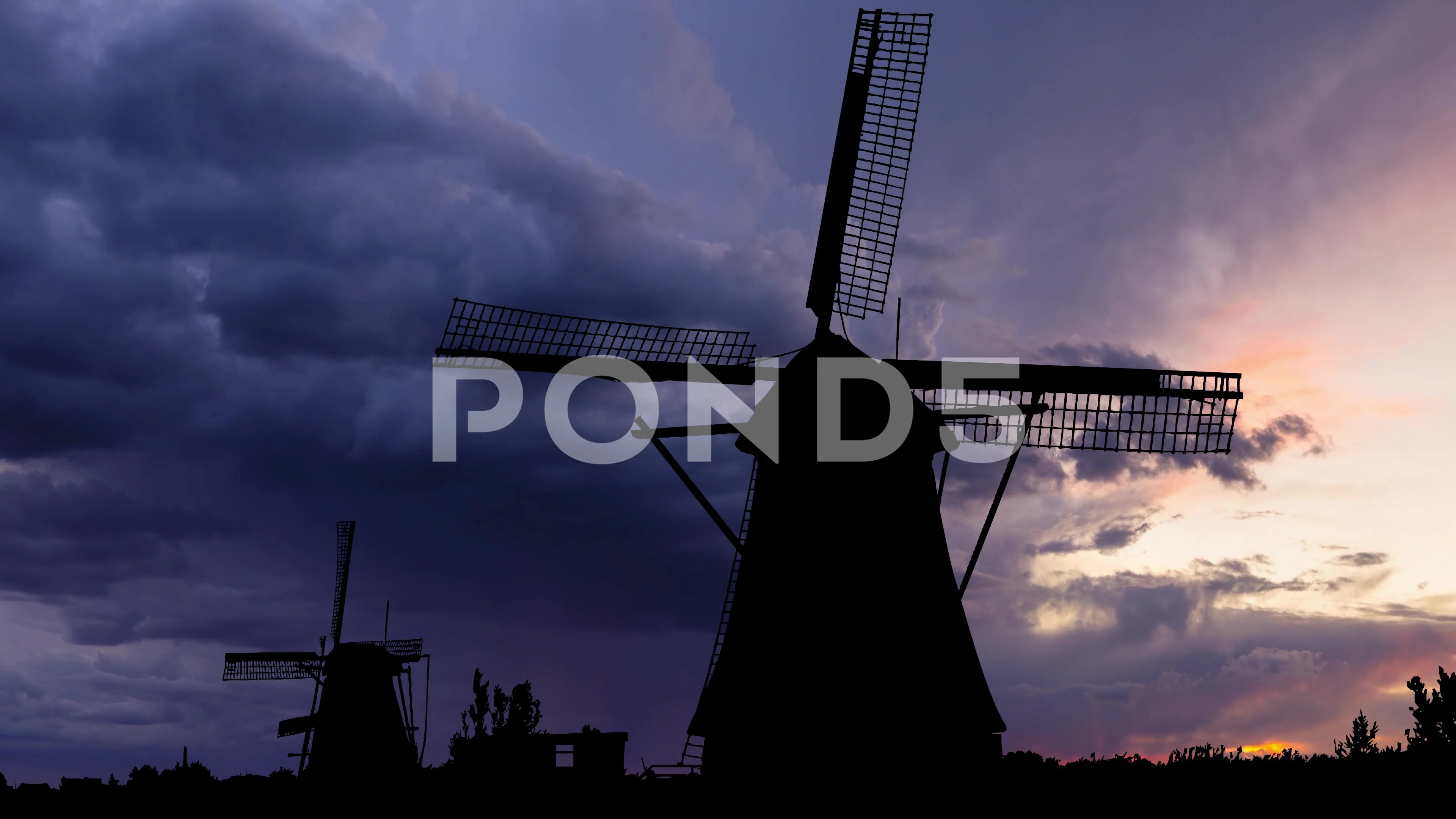 Working Windmills In The Trees