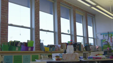 Window Behind Empty Desks in a Classroom | Stock Video | Pond5