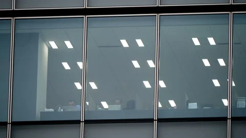 Window of office building with people wo... | Stock Video | Pond5
