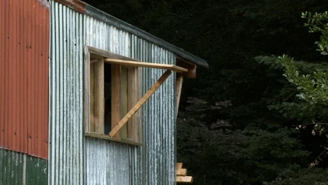 Window Propped Up By Wooden Beam | Stock Video | Pond5