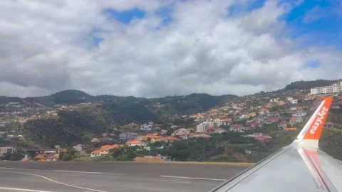 Window seat view of Easyjet airplane mov... | Stock Video | Pond5