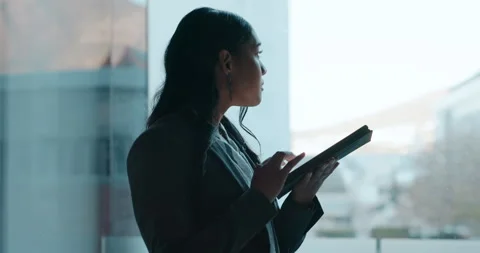 Window, thinking and woman with a tablet... | Stock Video | Pond5