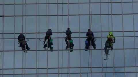 Window Washers On The Windows Of A Skysc... | Stock Video | Pond5