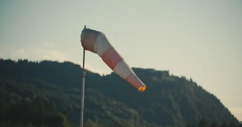 Windsock flying in wind at airfield | Stock Video | Pond5