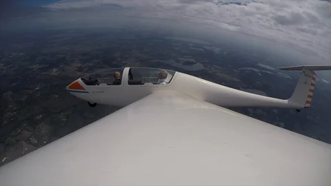 Wing view flying the glider plane and tu... | Stock Video | Pond5