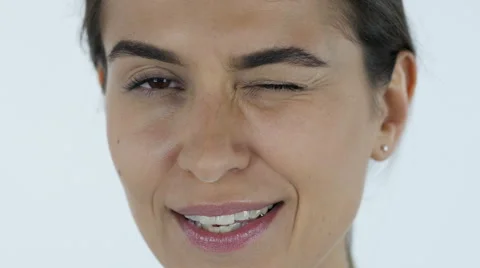 Winking Eye, Close up of Girl Face, Whit... | Stock Video | Pond5
