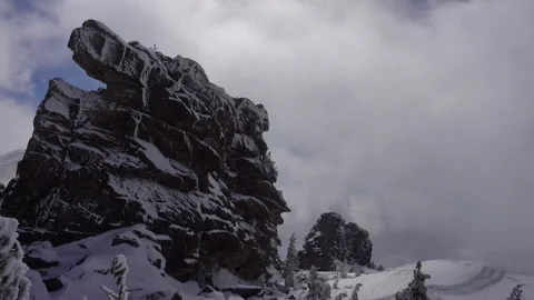 winter rocks on the background of flying... | Stock Video | Pond5