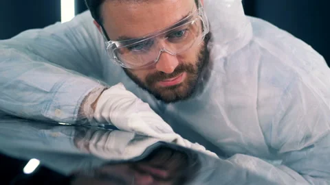 Wiping process of a car's glossy surface... | Stock Video | Pond5