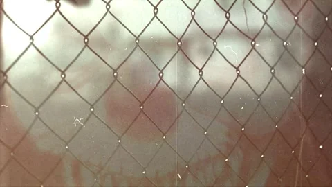 Wire fence with ghost overlay. spooky an... | Stock Video | Pond5