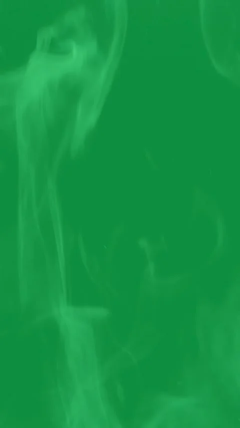 Wispy White Smoke Blowing with Green Scr... | Stock Video | Pond5