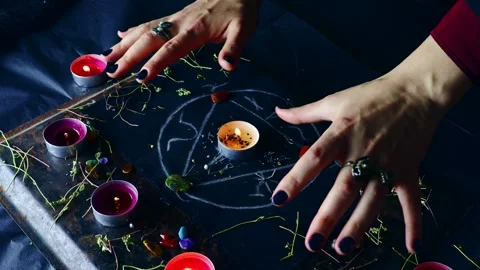 Witch hands performing a black magic rit... | Stock Video | Pond5