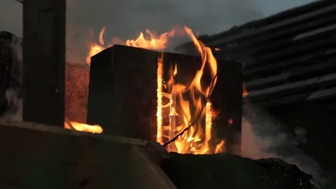 Woden crate on fire - destroyed building... | Stock Video | Pond5