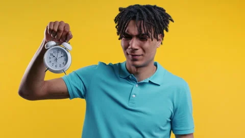 Woken up by alarm clock sleepy man. Yell... | Stock Video | Pond5