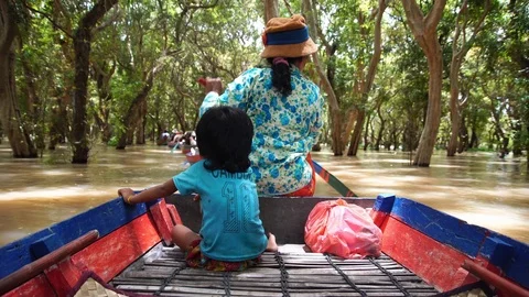 Woman and kid on a raft canoe in famous ... | Stock Video | Pond5