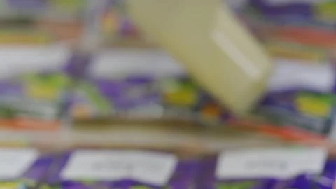 woman applying labels with handheld labe... | Stock Video | Pond5