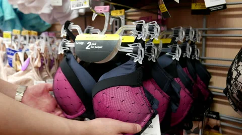 Woman buying bra inside Walmart store wi... | Stock Video | Pond5
