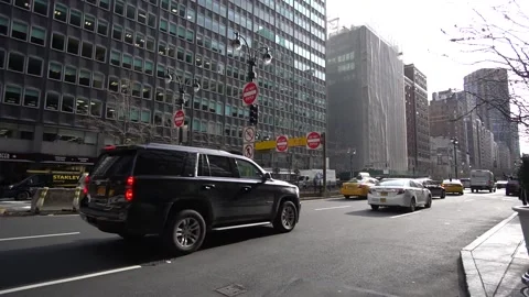 Woman catching a yellow cab in New york.... | Stock Video | Pond5