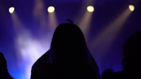 Woman clapping at a music concert | Stock Video | Pond5