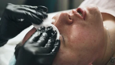 The woman is cleansed of the face, tones... | Stock Video | Pond5