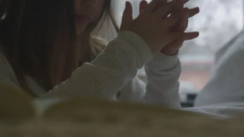 Woman Closing Her Hands in Prayer During... | Stock Video | Pond5