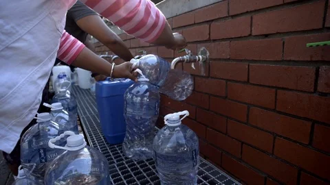 woman collect water during drought in Ca... | Stock Video | Pond5