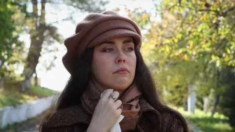 Woman crying quietly in the park, wiping... | Stock Video | Pond5