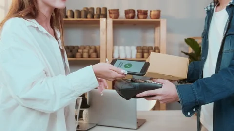 woman customer using QR code payment via... | Stock Video | Pond5