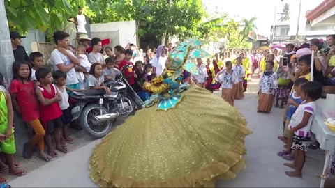 Woman dance with Santo Nino statue, Sinu... | Stock Video | Pond5