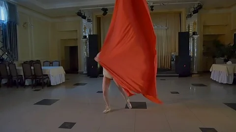 Woman dancer on red aerial silk, aerial ... | Stock Video | Pond5