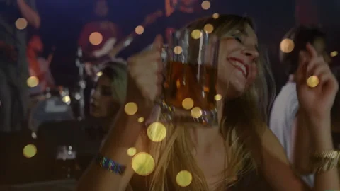 Woman dancing with beer mug in bar, show... | Stock Video | Pond5