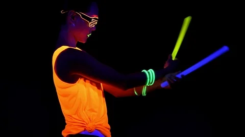 Woman dancing in UV blacklight, glow par... | Stock Video | Pond5