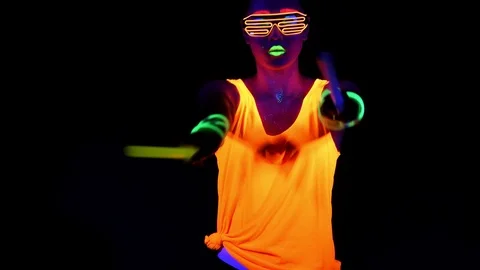Woman dancing in UV blacklight, glow par... | Stock Video | Pond5
