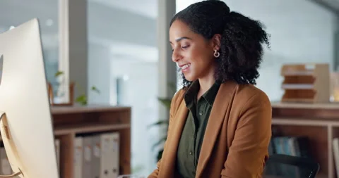 Woman at desk with computer, drinking wa... | Stock Video | Pond5