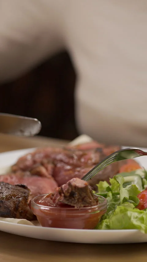Eating Steak Stock Footage ~ Royalty Free Stock Videos | Pond5