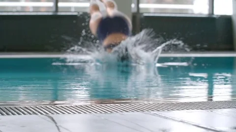 Woman Diving and Emerging in Swimming Po... | Stock Video | Pond5