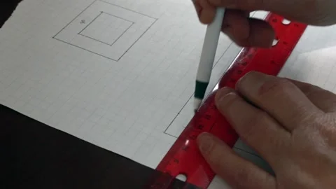 Woman drawing a line on lined paper with... | Stock Video | Pond5