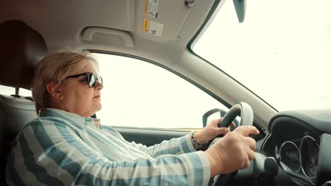 Woman Driver Turning Steering Wheel In C... | Stock Video | Pond5