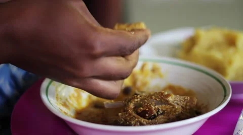 African Eating Soup Stock Footage ~ Royalty Free Stock Videos | Pond5