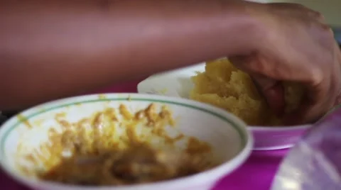 African Eating Soup Stock Footage ~ Royalty Free Stock Videos | Pond5